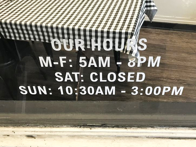 Hours posted with Southern directness&mdash;closed Saturdays because even comfort food deserves a day off.