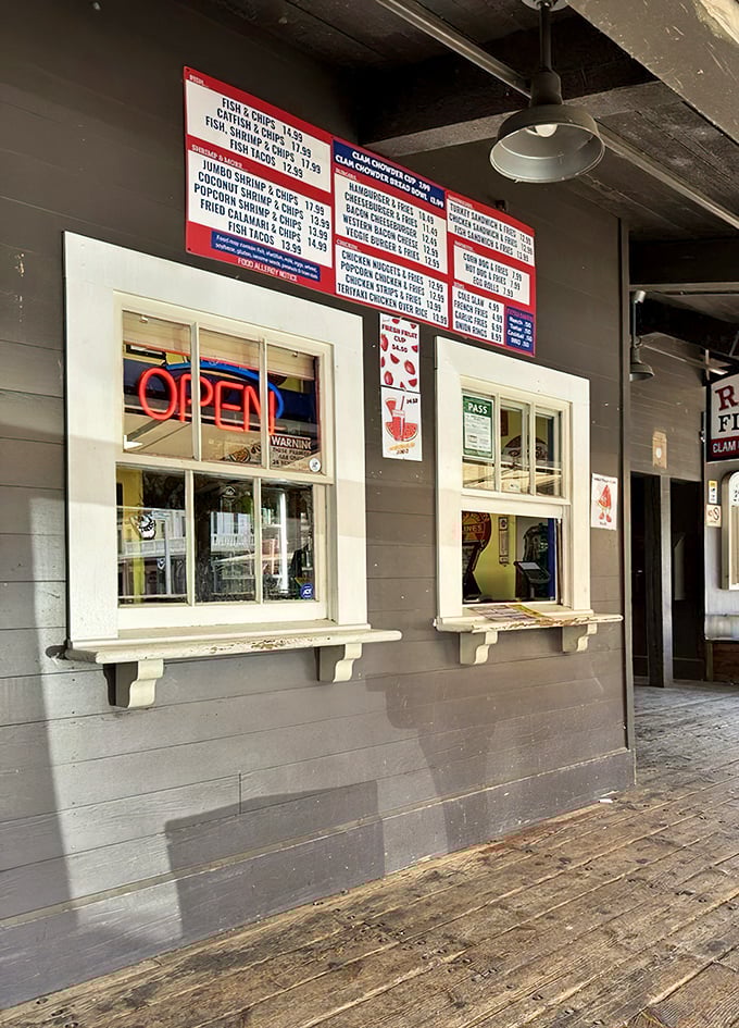 The order window&mdash;where dreams of perfectly fried seafood begin their journey from kitchen to eager taste buds.