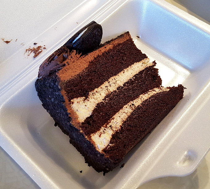 Chocolate cake with the perfect frosting-to-cake ratio. Each layer tells a different chapter in the story of your impending food coma.