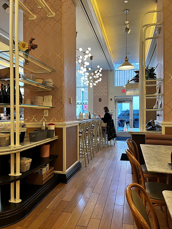 The thoughtful interior design balances modern elegance with cozy comfort &ndash; those globe lights creating the perfect atmosphere for both first dates and food photos.