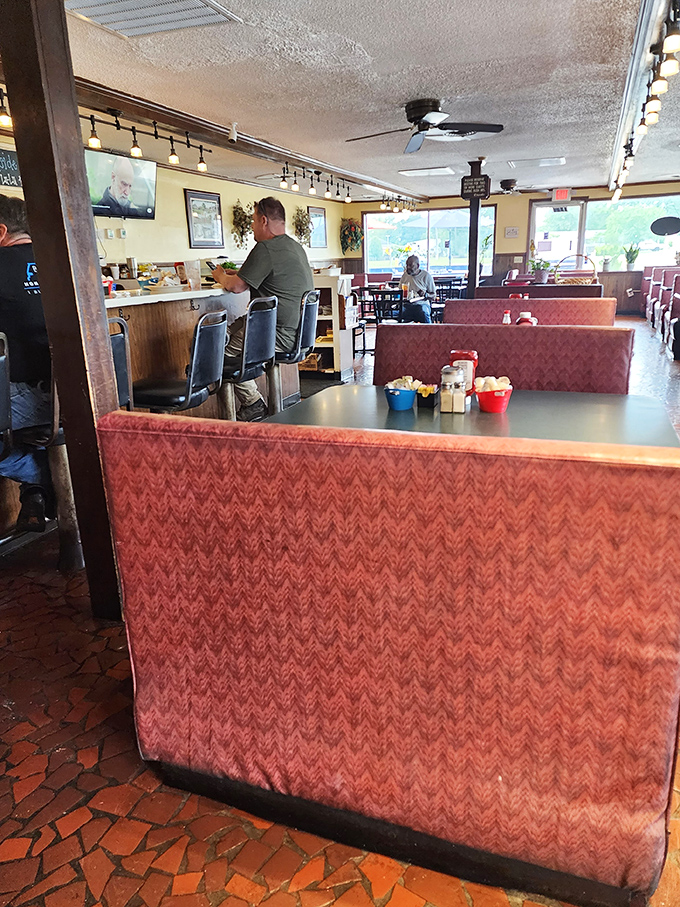 Counter seating: where solo diners become regulars and servers remember exactly how you like your eggs after just two visits.