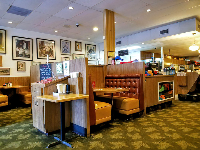 Wood paneling and vintage photographs create that perfect diner atmosphere&mdash;like stepping into a time machine set to "comfort."