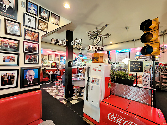 Every inch of wall space tells a story&mdash;photos, memorabilia, and street signs create the perfect backdrop for comfort food conversations.