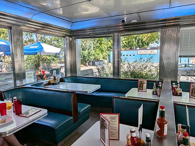 Sunlight streams through windows, illuminating turquoise booths that have cradled countless conversations, first dates, and food epiphanies. Diner magic at work.