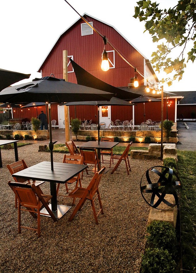 The outdoor seating area with string lights transforms evening dining into a magical experience &ndash; like eating at a sophisticated country fair.