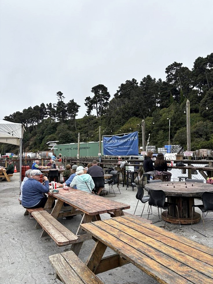 Weather-worn picnic tables with ocean views&mdash;this is where you'll contemplate whether ordering another deep-fried cheesecake is acceptable behavior.