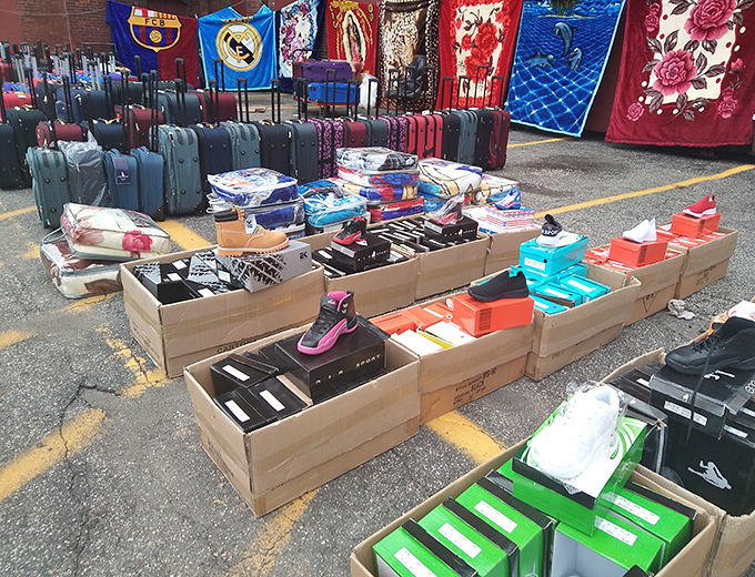 The outdoor extension of bargain paradise. Those blankets with soccer team logos have probably witnessed more victories than the teams themselves lately.
