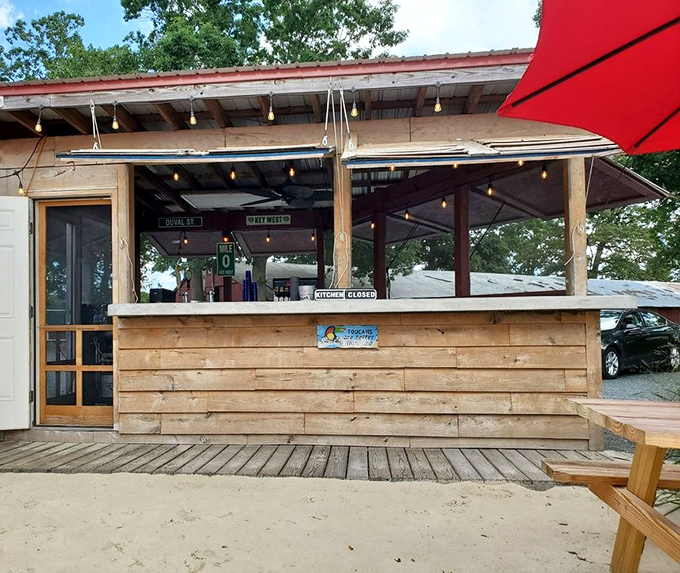 The outdoor counter beckons with promise, a casual spot to grab a cold one while waiting for your order of smoky delights.