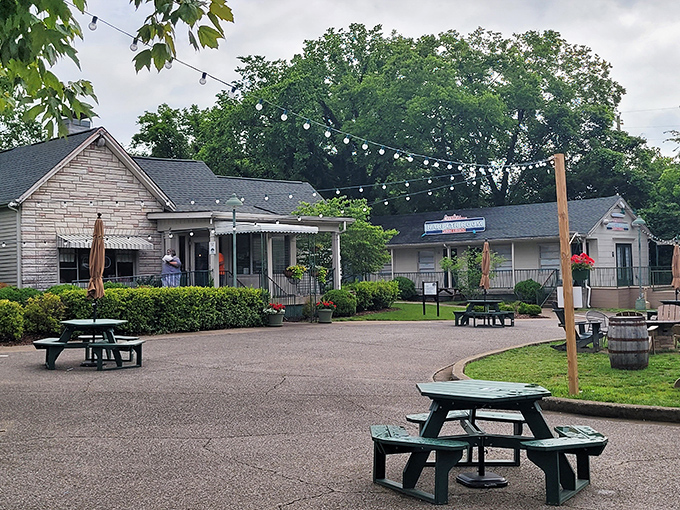 Outdoor seating under string lights offers the perfect spot for a leisurely Southern feast al fresco.
