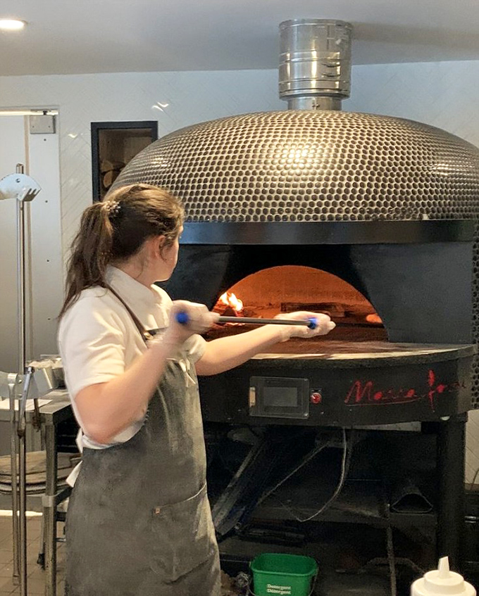 A pizza oven that means business &ndash; this golden-domed beauty cranks out pies with authentic wood-fired swagger.