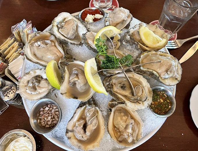 These oysters aren't just served&mdash;they're presented like pearls on a silver platter, waiting to slide down your throat with a lemony kiss.