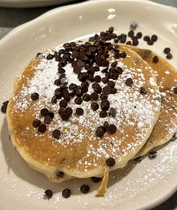 Chocolate chip pancakes dusted with powdered sugar—breakfast or dessert? The beauty is you don't have to choose.