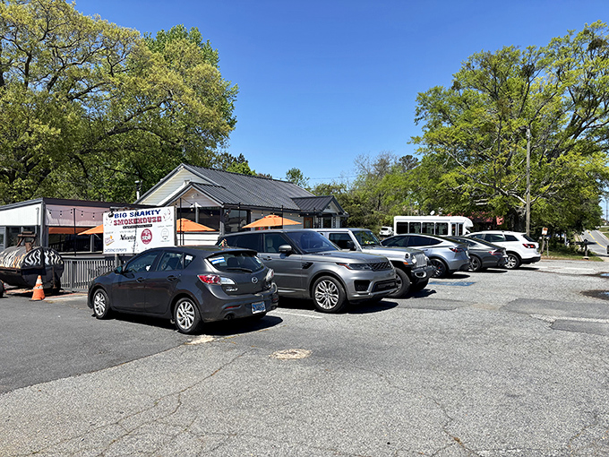 A full parking lot is the most honest review a barbecue joint can get&mdash;these cars represent people who know exactly where good eating happens.
