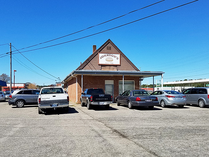 The parking lot tells the story: a mix of vehicles from near and far, all united by the universal language of exceptional cheeseburgers.