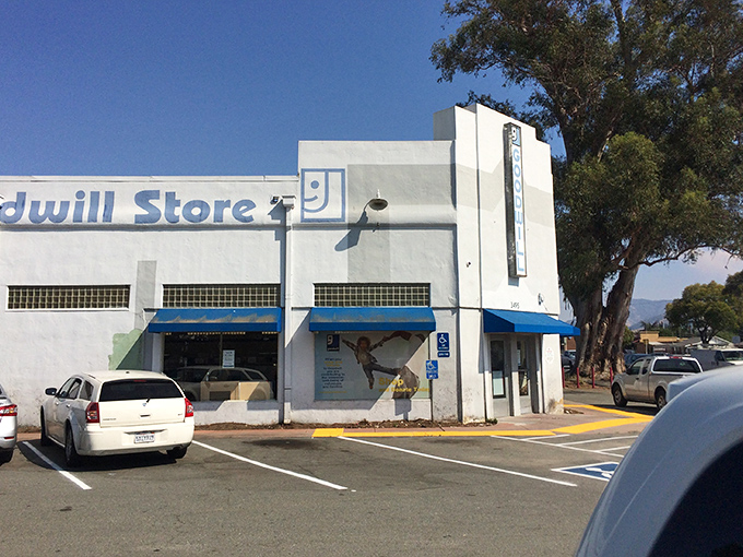 The classic white-walled Goodwill exterior stands like a community landmark, promising affordable retail therapy under the California sun.