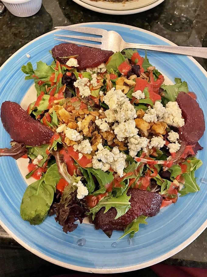 A salad that defies the "rabbit food" stereotype, with blue cheese crumbles and beets adding drama to every colorful forkful.
