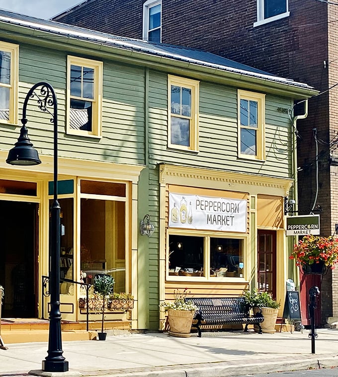 Peppercorn Market's cheerful yellow facade promises specialty foods that make everyday meals extraordinary&mdash;proof that culinary adventure awaits in small towns.