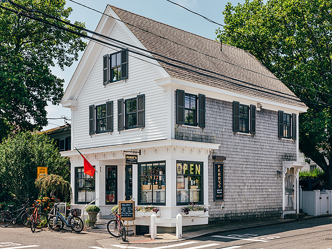 Weathered shingles and white trim showcase that timeless Cape Cod aesthetic that never goes out of fashion.