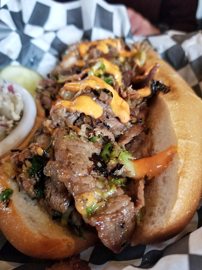 This isn't just a sandwich&mdash;it's a masterclass in meat architecture, with each layer of brisket building toward flavor nirvana.