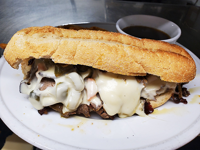 The Philly cheesesteak that makes Philadelphians nervous. Melted provolone cascading over thinly sliced beef like a dairy waterfall.