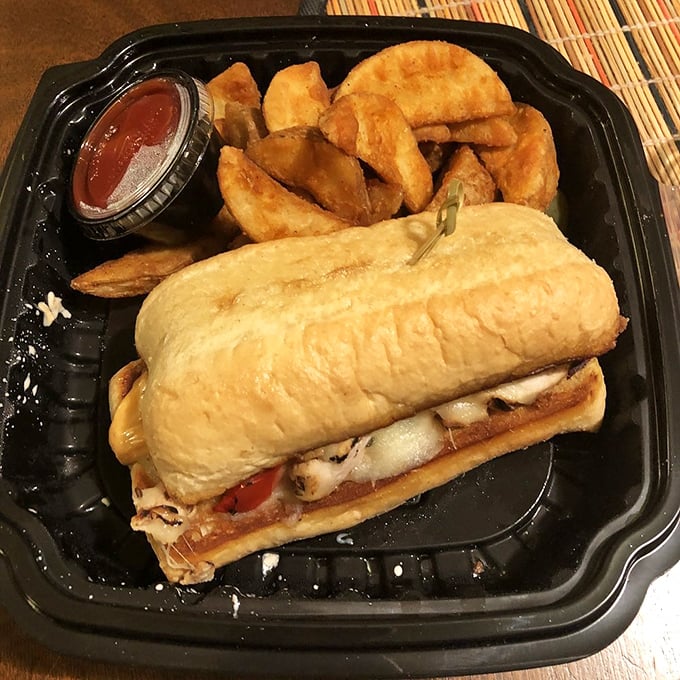 Even takeout maintains Hendel's standards – this sandwich and wedges travel well but won't last long once you smell what's in that container.