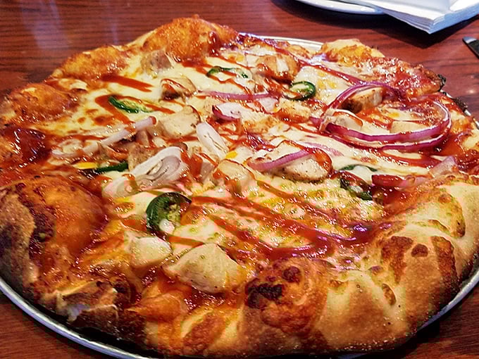 A pizza that understands the importance of proper cheese-to-sauce ratio. Those jalape&ntilde;os and red onions aren't just toppings&mdash;they're flavor ambassadors.