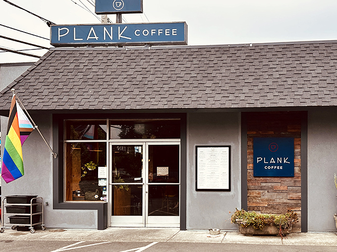 Plank Coffee&mdash;where the rainbow flag welcomes all and the espresso machine hums the soundtrack to your morning revelation.