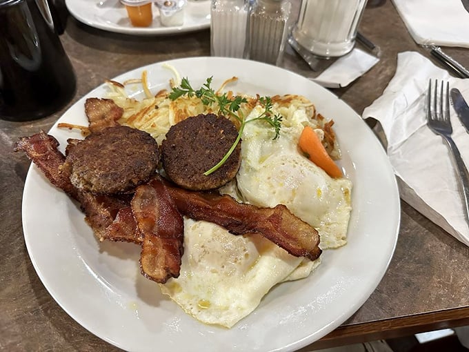 The breakfast platter that answers the eternal question: "Why choose one protein when you can have them all?"