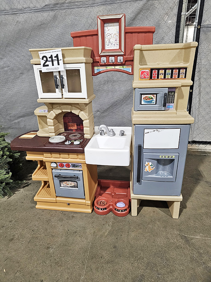 Childhood dreams at yard sale prices. This play kitchen set awaits a new home where imagination can cook up endless adventures.