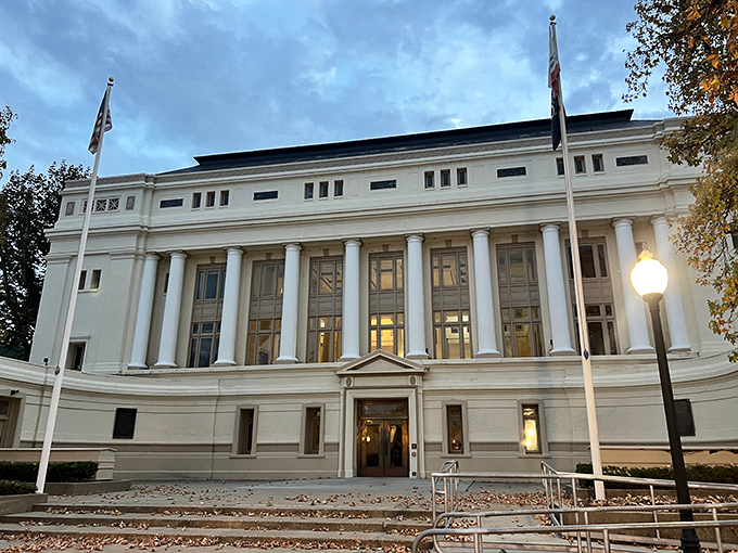 The Plumas County Courthouse stands dignified against evening skies, its columns a testament to small-town civic pride done right.