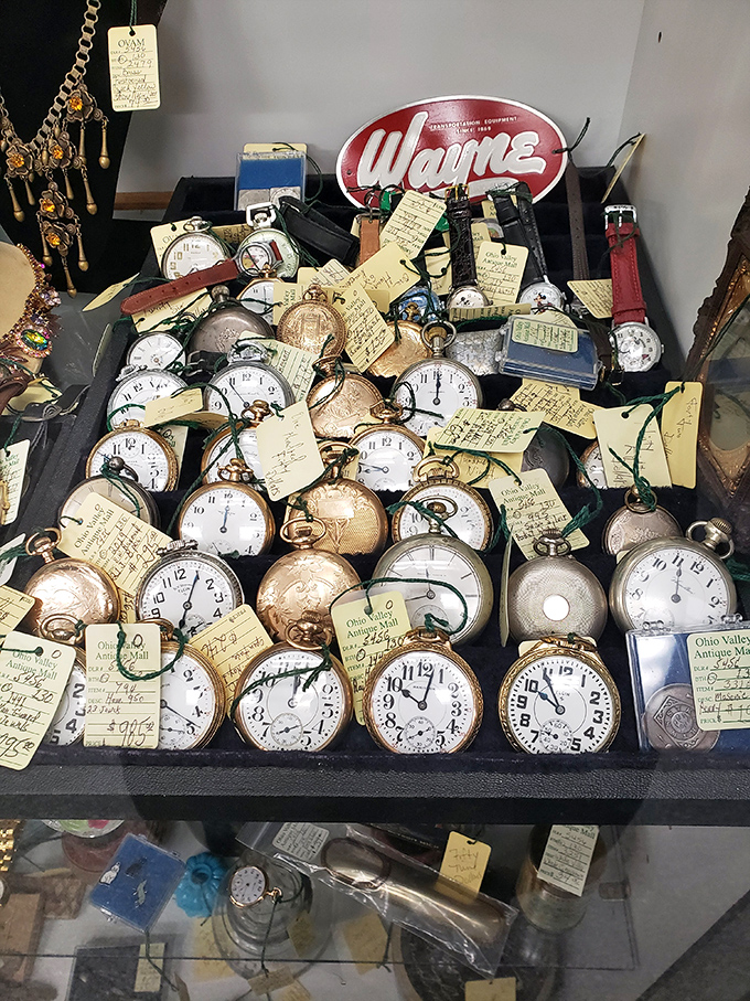 A tray of pocket watches, each one frozen at a different moment in time. Hourglasses for gentlemen who've long since departed.