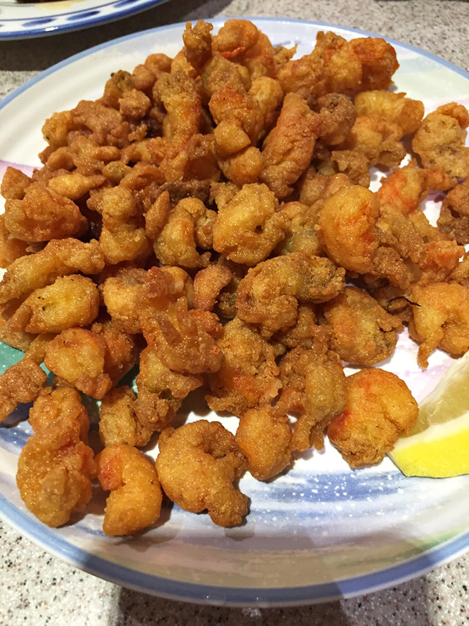 Crispy popcorn crawfish that pop in your mouth with each bite, delivering Gulf Coast flavor in bite-sized packages of pure joy.