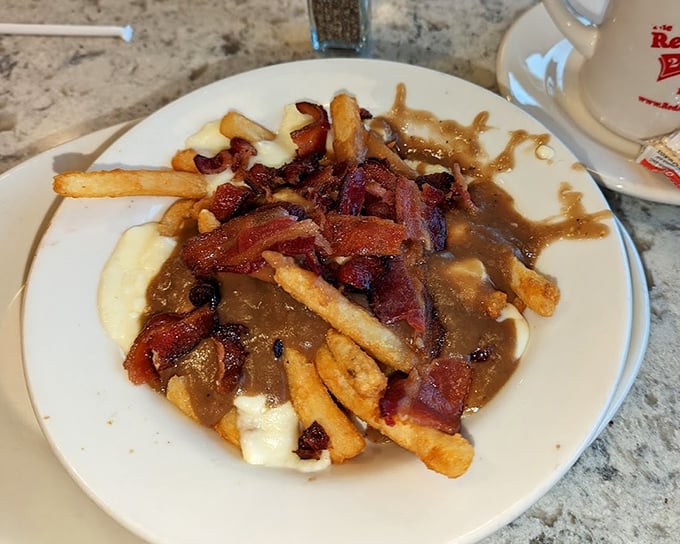 Poutine with bacon &ndash; because sometimes good things can become extraordinary with just one simple, porky addition.