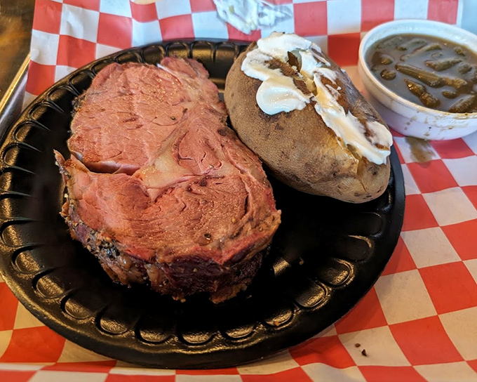 Prime rib that doesn't need a fancy steakhouse setting to shine&mdash;just a black plate, a loaded potato, and your undivided attention.