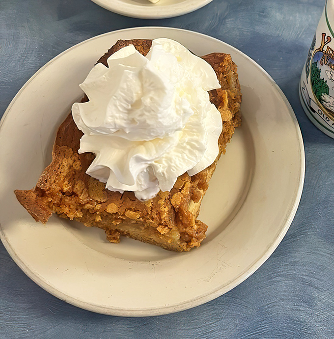 This isn't just dessert masquerading as breakfast &ndash; it's pumpkin bread pudding crowned with whipped cream that makes you question why we have food rules at all.