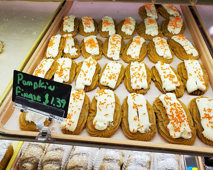 Pumpkin whoopie pies with their vibrant orange-flecked cream filling announce fall's arrival better than any calendar ever could.