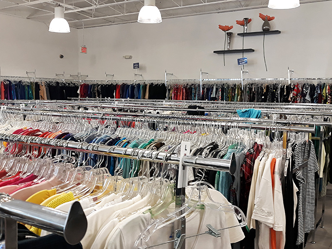 Color-coded clothing racks create a shopper's rainbow, where patience and persistence lead to the pot of gold: designer labels at bargain prices.