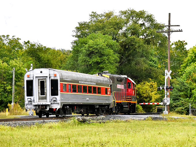 The humble railroad crossing—where impatient drivers tap steering wheels while you glide by, smugly sipping coffee without a care.