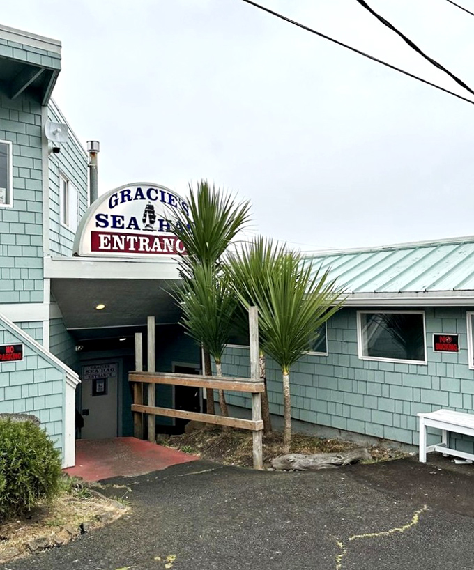 Around back, Gracie's Sea Hag welcomes hungry visitors with coastal charm. Those palm trees are the Oregon coast's version of a red carpet entrance.