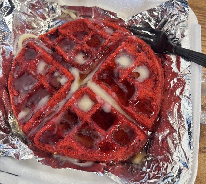 Hold the phone – that's a red velvet waffle playing footsie with seafood. Genius or madness?