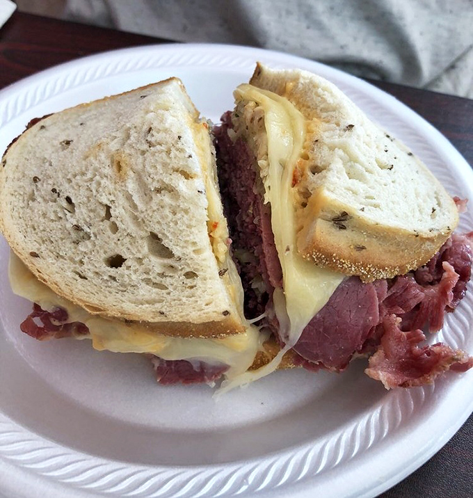 The star of the show: a Reuben sandwich with more layers than your favorite mystery novel. That melty cheese is making a break for freedom.