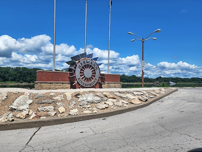 Hermann's riverfront welcome sign spins like a paddlewheel, nodding to the Missouri River's importance. Stone and brick create a lasting first impression.