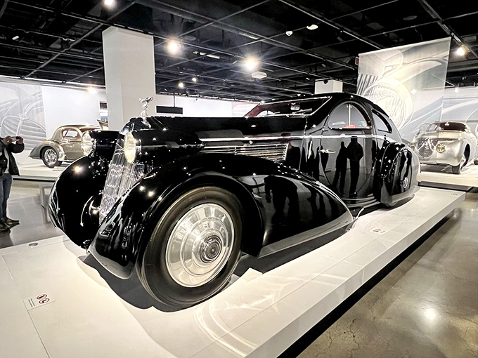 This magnificent black Rolls-Royce embodies automotive royalty. It doesn't just park&mdash;it arrives, making an entrance worthy of old Hollywood glamour.