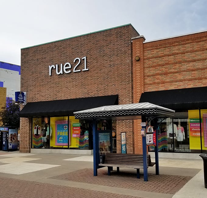 Rue21's brick fa&ccedil;ade and rainbow window displays beckon to the younger crowd. Where teens can spend their allowance while parents recuperate on that thoughtfully placed bench.