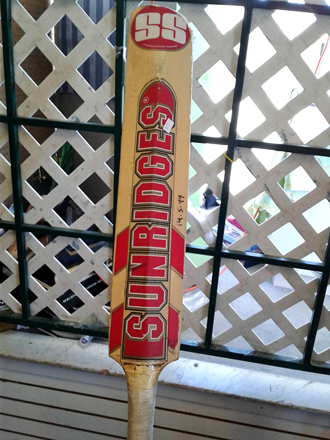 That vintage Sunridges cricket bat isn't just sporting equipment&mdash;it's a conversation piece waiting to confuse your American friends about the rules of cricket.