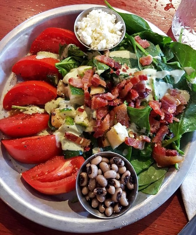 A salad that doesn't feel like punishment, with fresh tomatoes, bacon, and beans proving that eating greens can actually be joyful. 