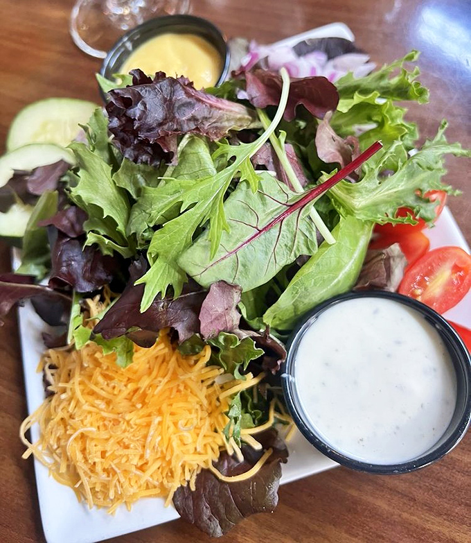A salad that doesn't apologize for being a salad &ndash; fresh greens standing proud with proper Southern hospitality.