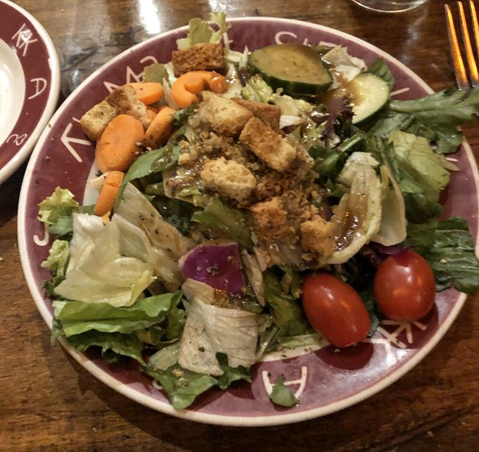 A salad that doesn't apologize for being healthy – it's too busy showing off its garden-fresh ingredients and crunchy croutons.