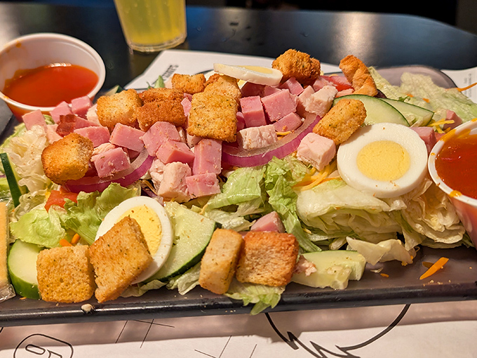 A salad that doesn't apologize for being a salad &ndash; it's brought reinforcements of ham, egg, and croutons to the flavor party.