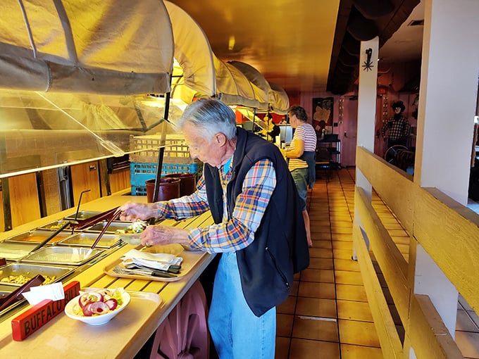 The salad bar in all its glory&mdash;a self-serve adventure where you're the captain of your vegetable destiny. Sneeze guard included at no extra charge!